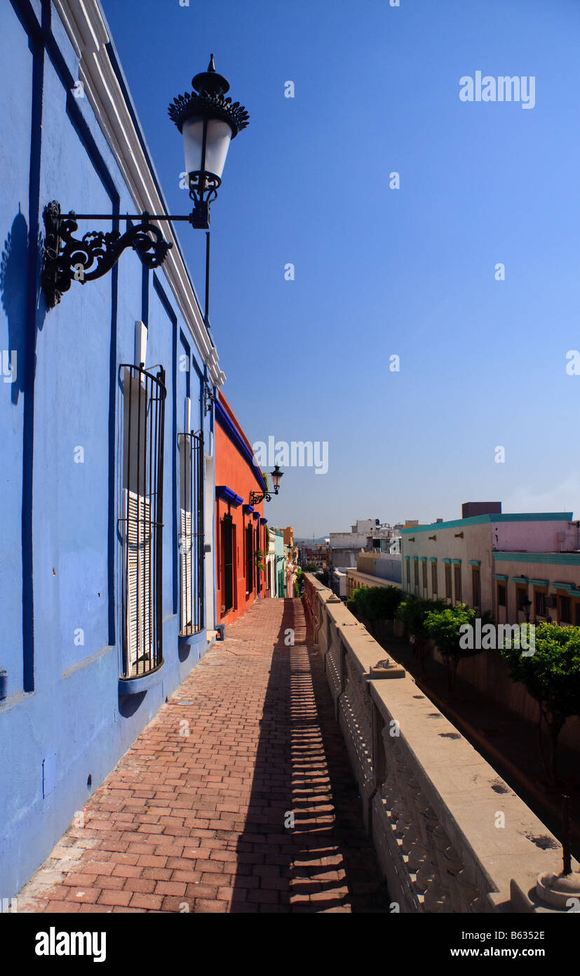 Ancient pathway in Mazatlan with bright blue buildings Stock Photo - Alamy