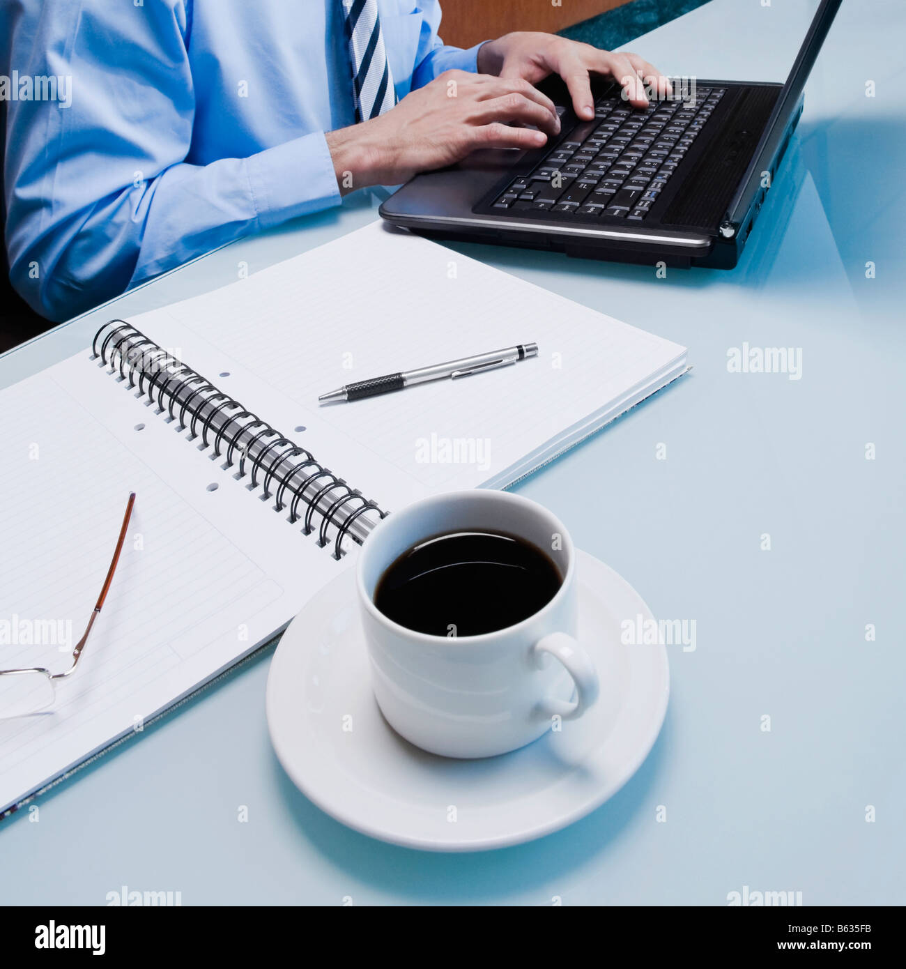 Mid section worker working table hi-res stock photography and images ...