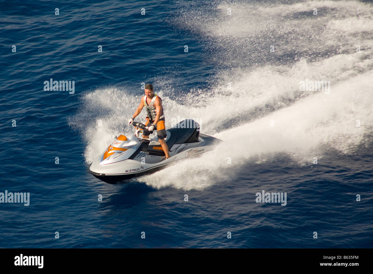 Riding on jet ski hi-res stock photography and images - Alamy