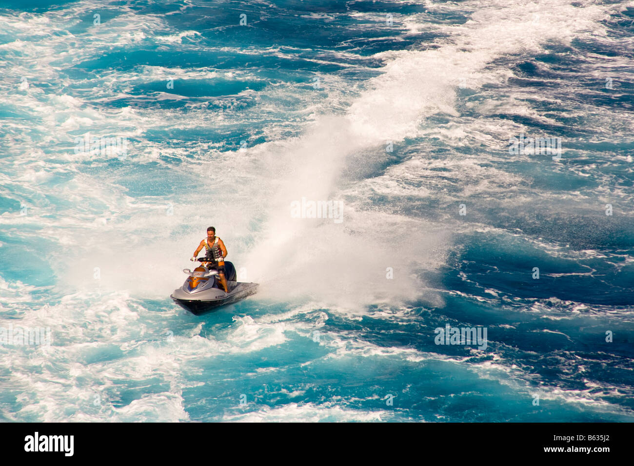 Jetskier riding the waves hi-res stock photography and images - Alamy
