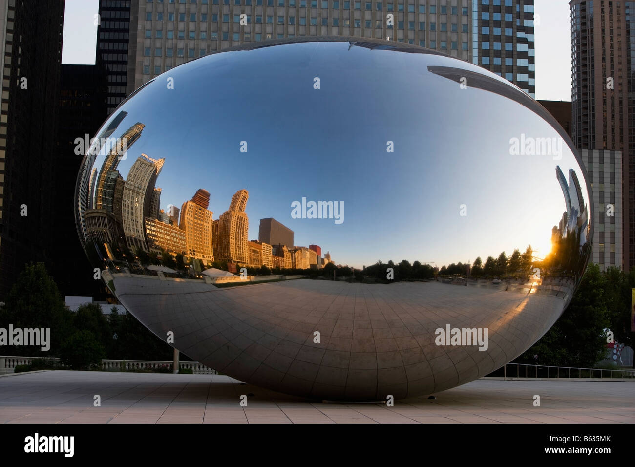 Reflection buildings on sculpture bean hi-res stock photography and ...