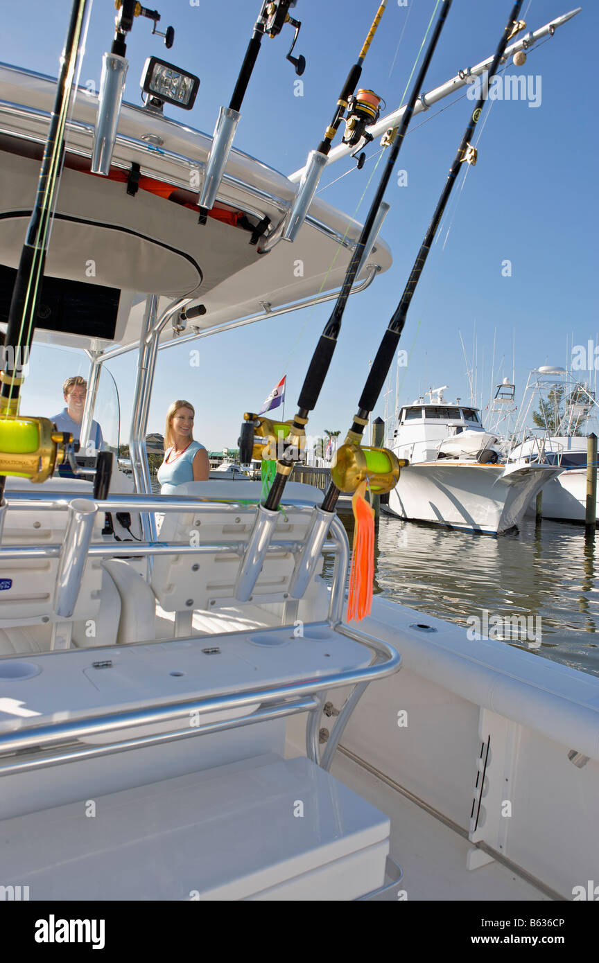 Couple in a speedboat Stock Photo - Alamy