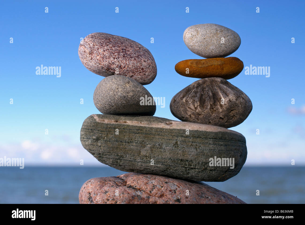 Stacks of pebbles at the seaside Stock Photo - Alamy