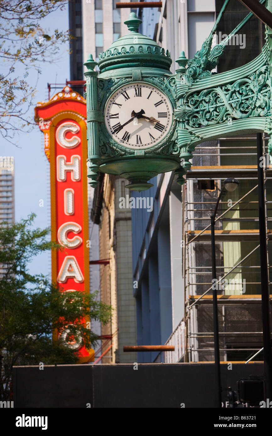 Clock in front of an entertainment building, Chicago Theater, Chicago ...