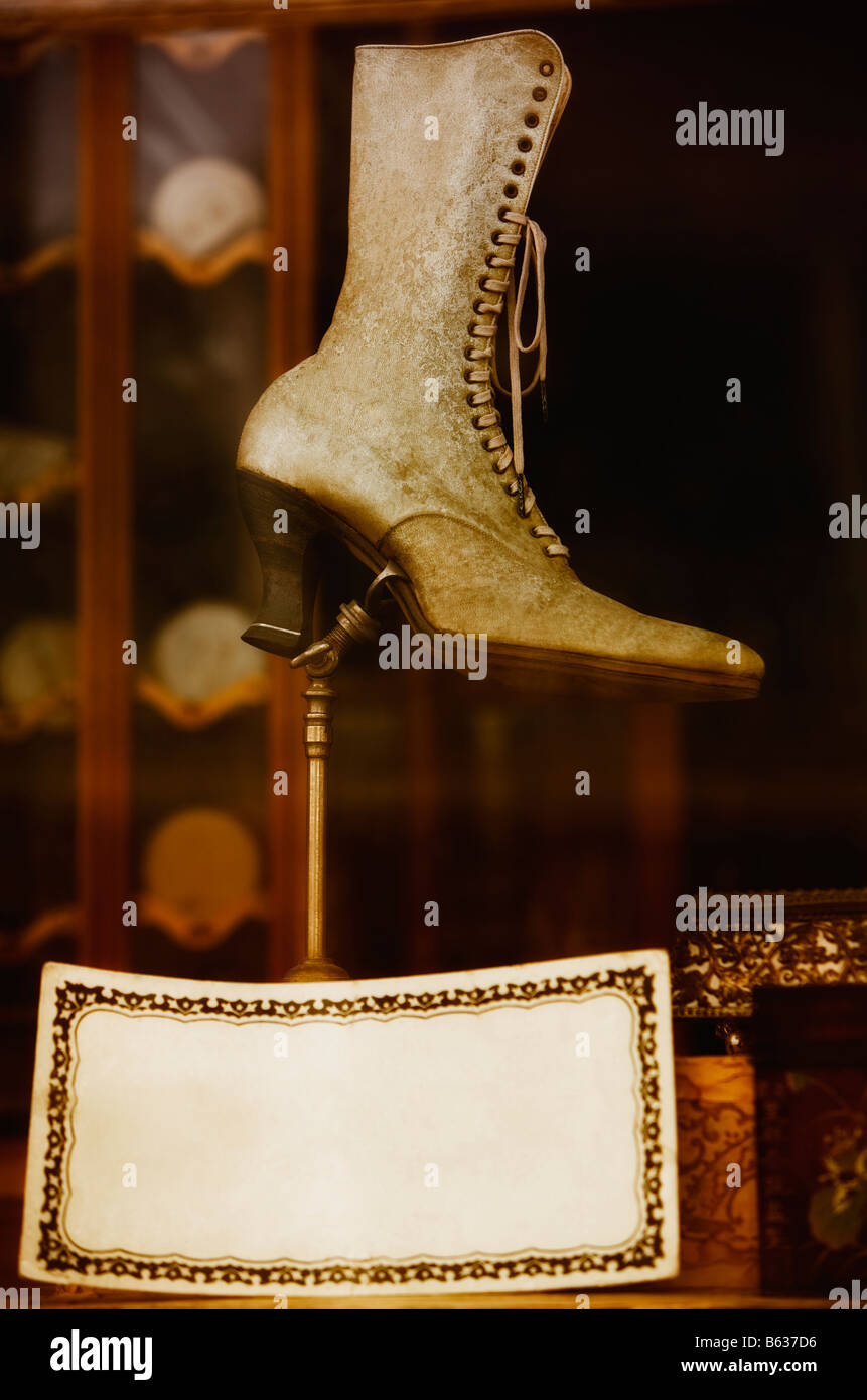 High heel boot in a window display Stock Photo - Alamy