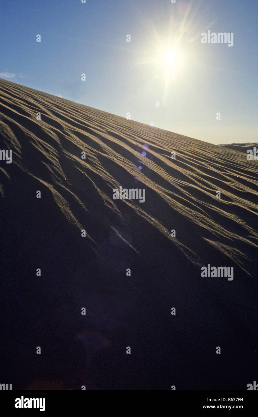 Sun in sky over sand dunes, California desert Stock Photo - Alamy