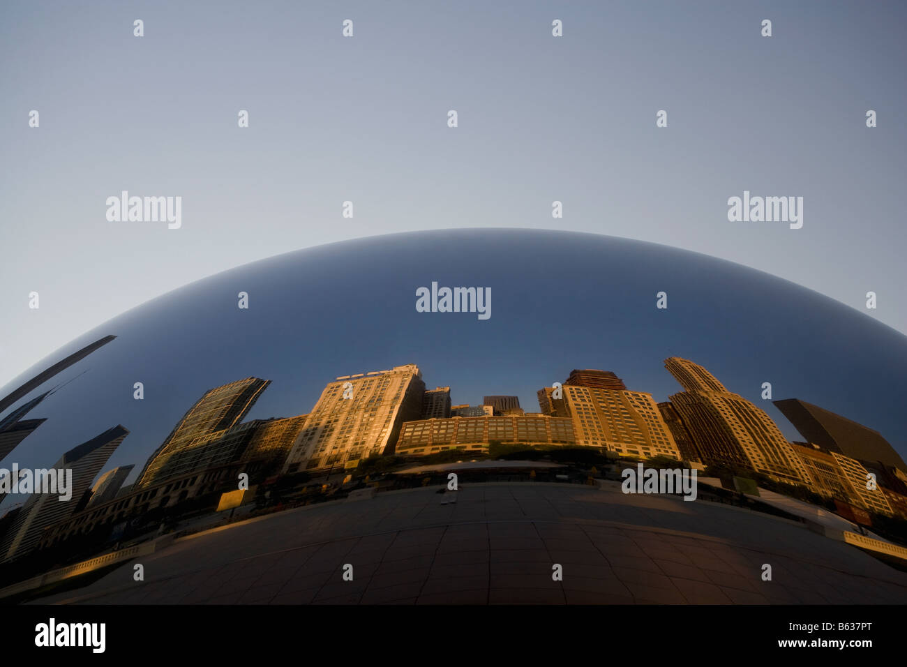 Reflection buildings on sculpture bean hi-res stock photography and ...