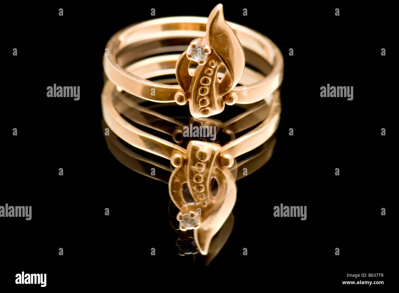 object on black Gold ring on black closeup Stock Photo - Alamy