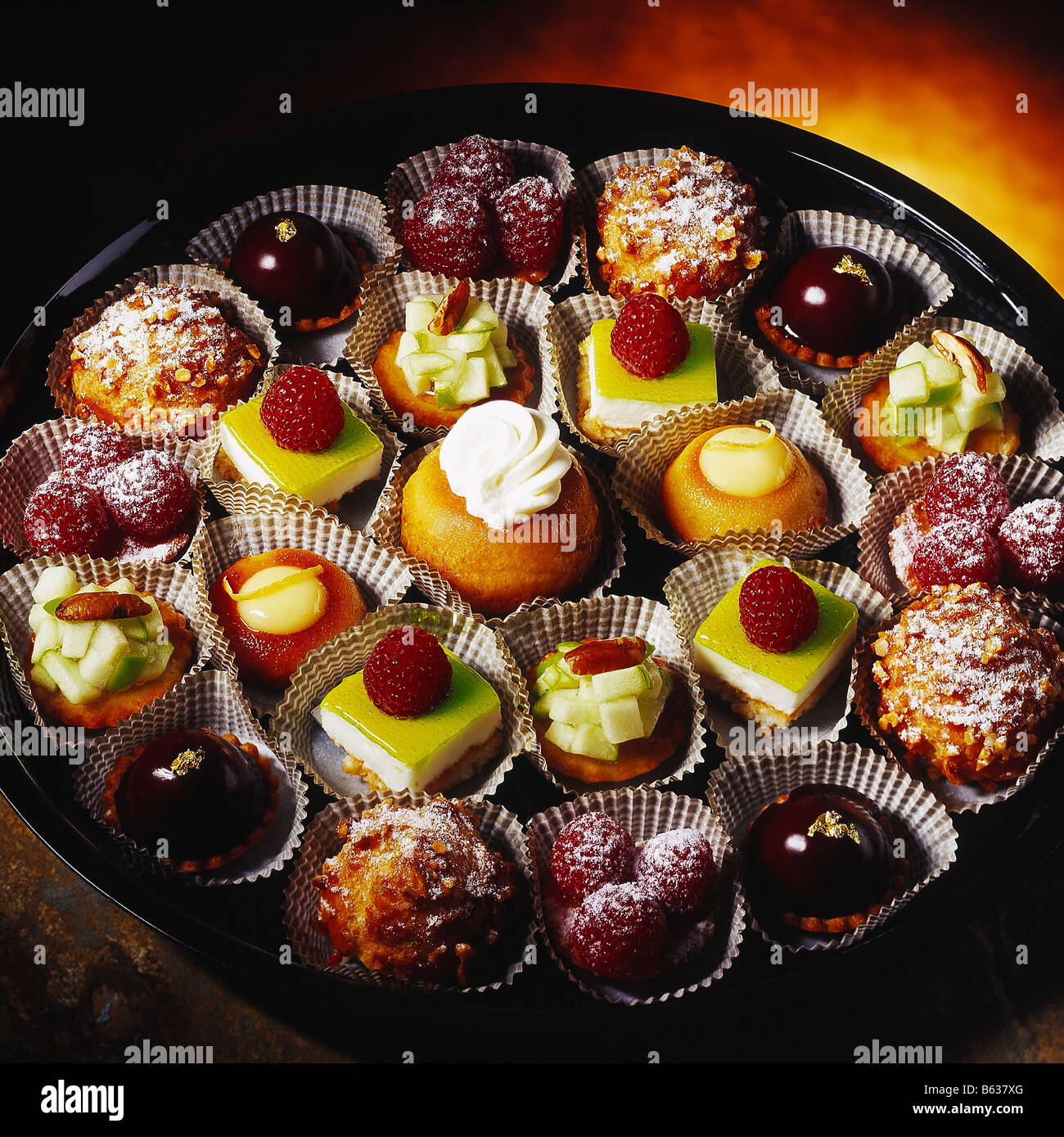 High angle view of various types of sweets on a plate Stock Photo - Alamy