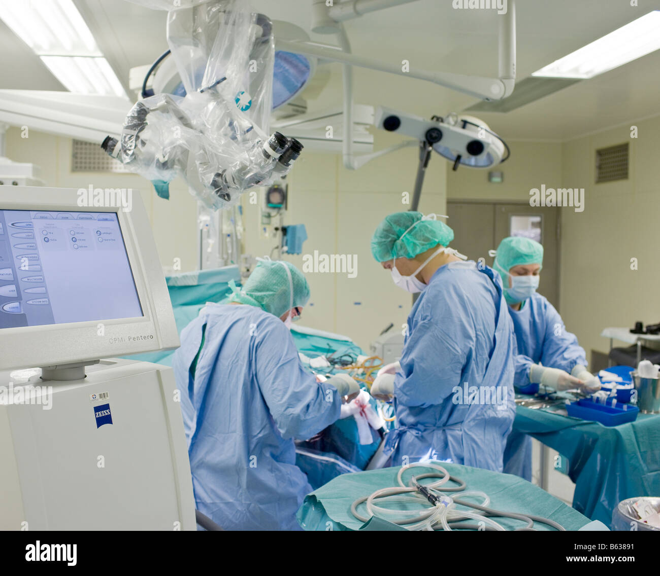 Neurosurgeons removing a benign brain tumor, Reykjavik, Iceland Stock ...