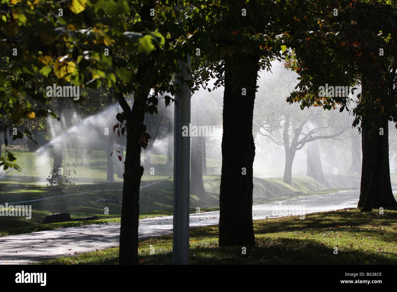 Water road sprinkler hi-res stock photography and images - Alamy