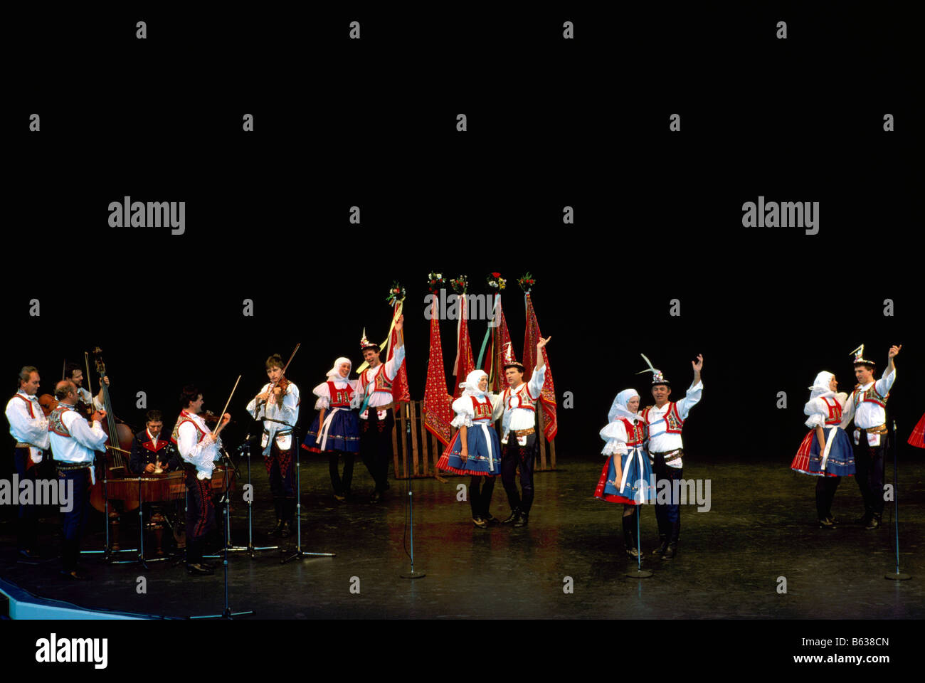 A Croatian Folk Dance Group performing on Stage in Traditional Costume ...