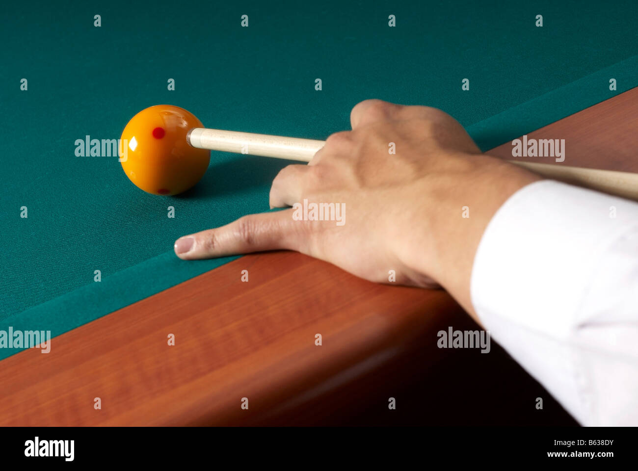 Close-up of a man's hand playing pool Stock Photo - Alamy
