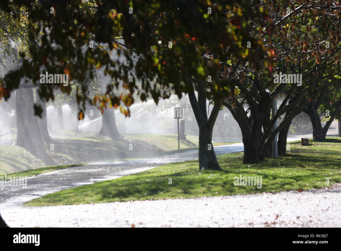 Water road sprinkler hi-res stock photography and images - Alamy