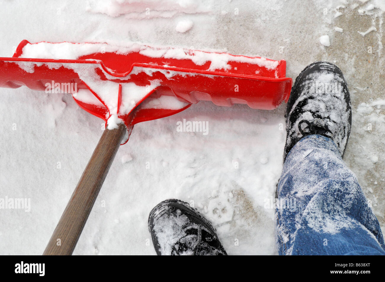 Snow shovel and winter boots depicting winter in Canada Sherwood Park ...