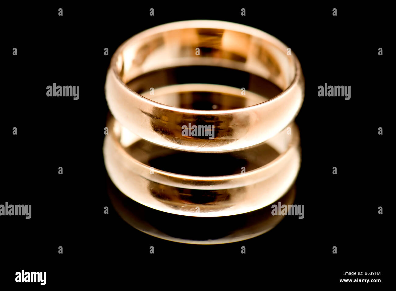 object on black Gold ring on black closeup Stock Photo - Alamy