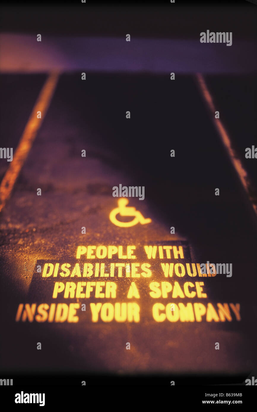 Close-up of text with a disabled sign at a parking lot Stock Photo - Alamy