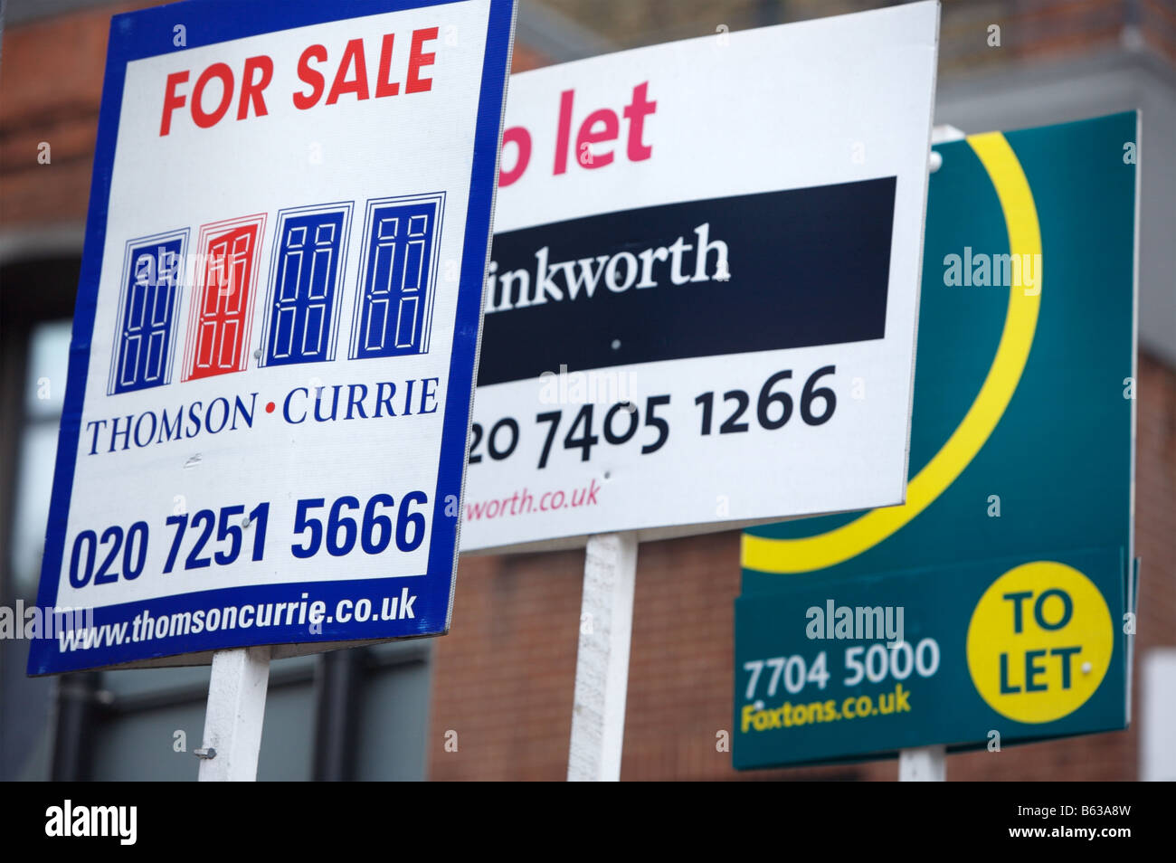 House for sale / let signs Stock Photo - Alamy