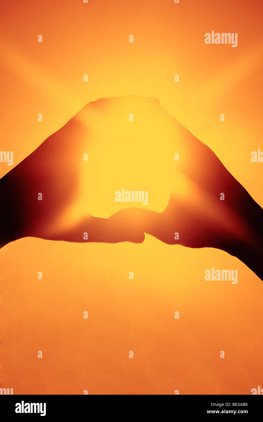 Sunlight shining through a finger frame Stock Photo - Alamy