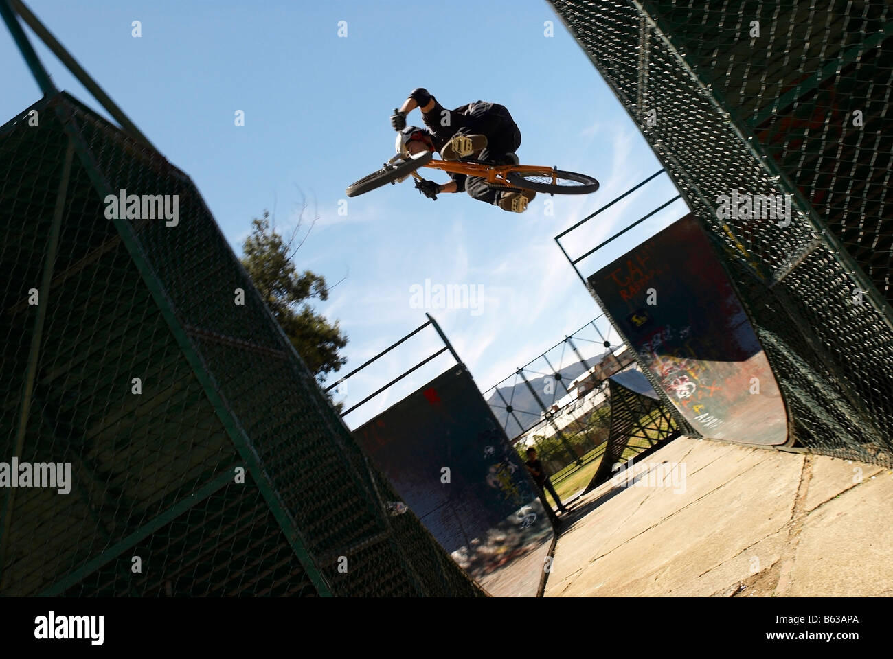 Low angle view of a BMX cyclist performing in mid-air Stock Photo - Alamy