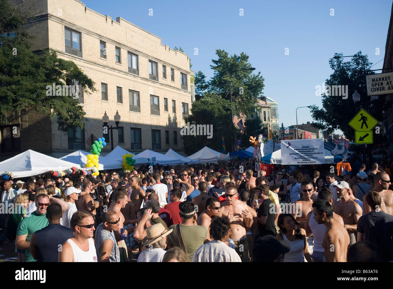 Tourists in front of a building, Boystown, Northalsted, Chicago ...