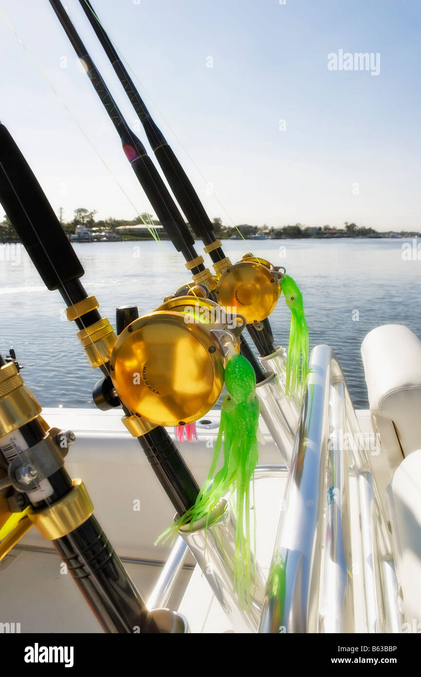 Fishing rods in a boat Stock Photo - Alamy