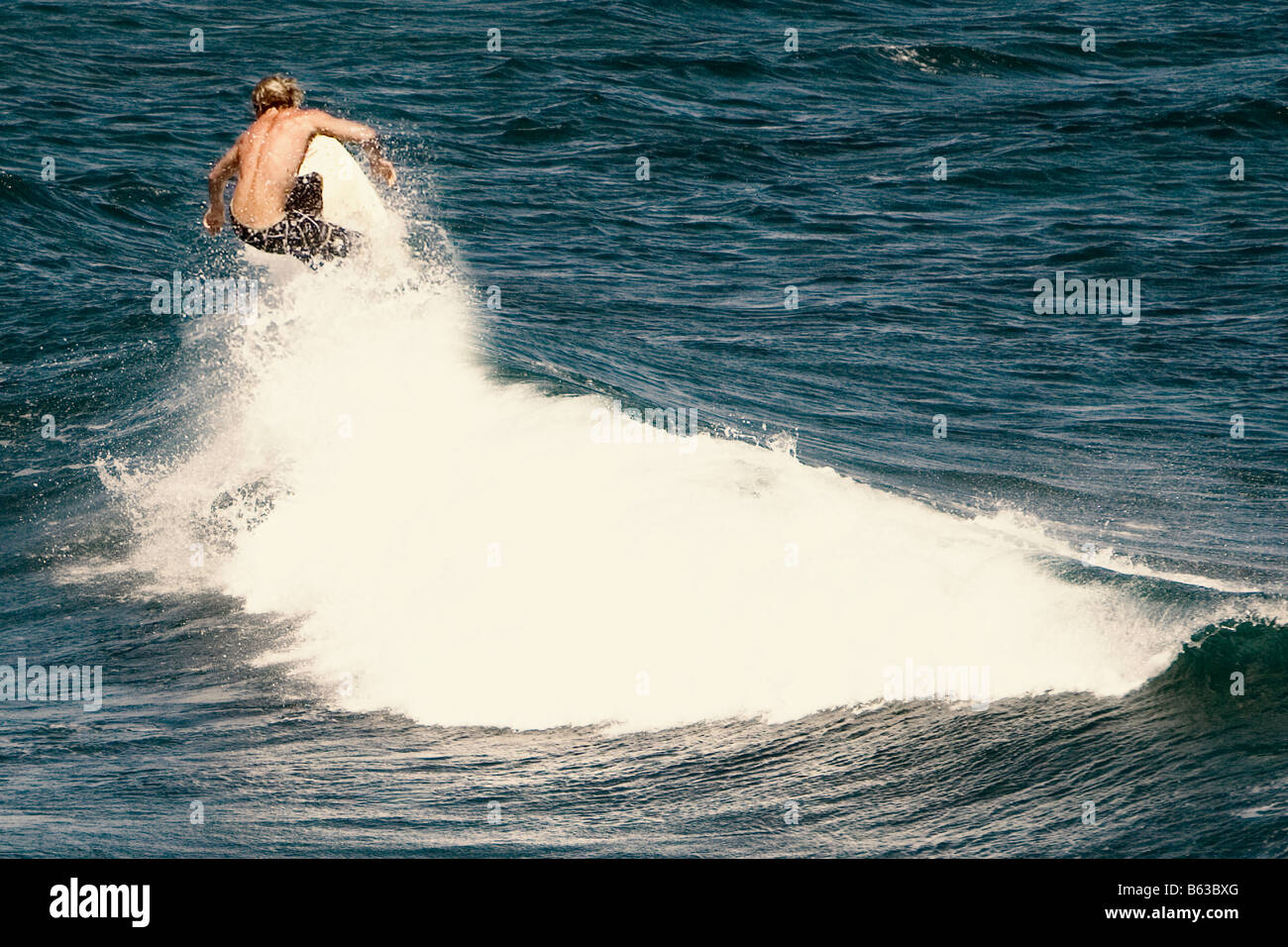 Tourist surfing in the sea, Hookipa Beach, Maui, Hawaii, USA Stock ...
