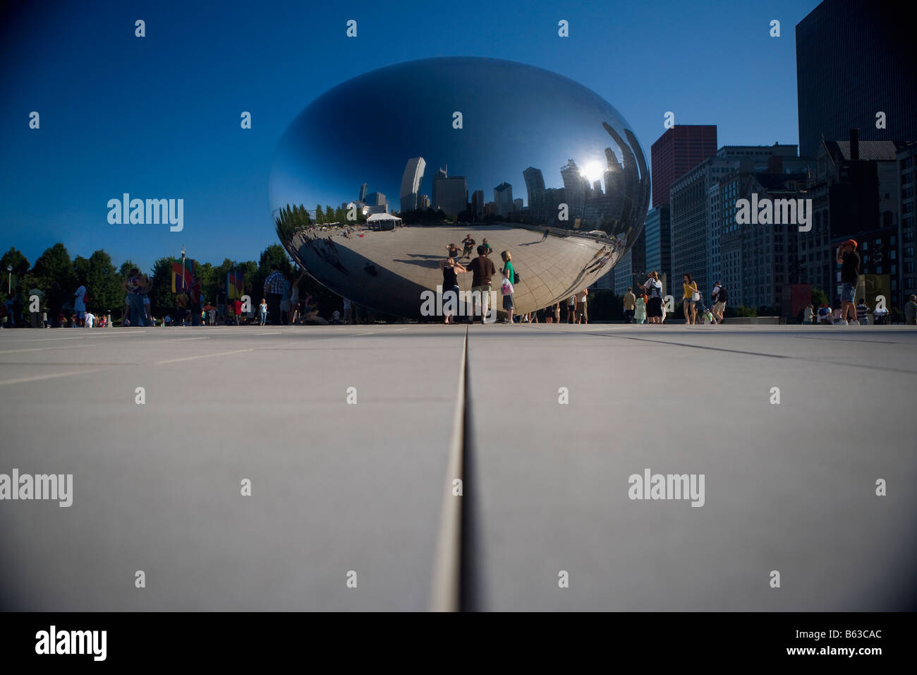 Bean sculpture at a Town square, The Bean, Cloud Gate, Millennium Park ...