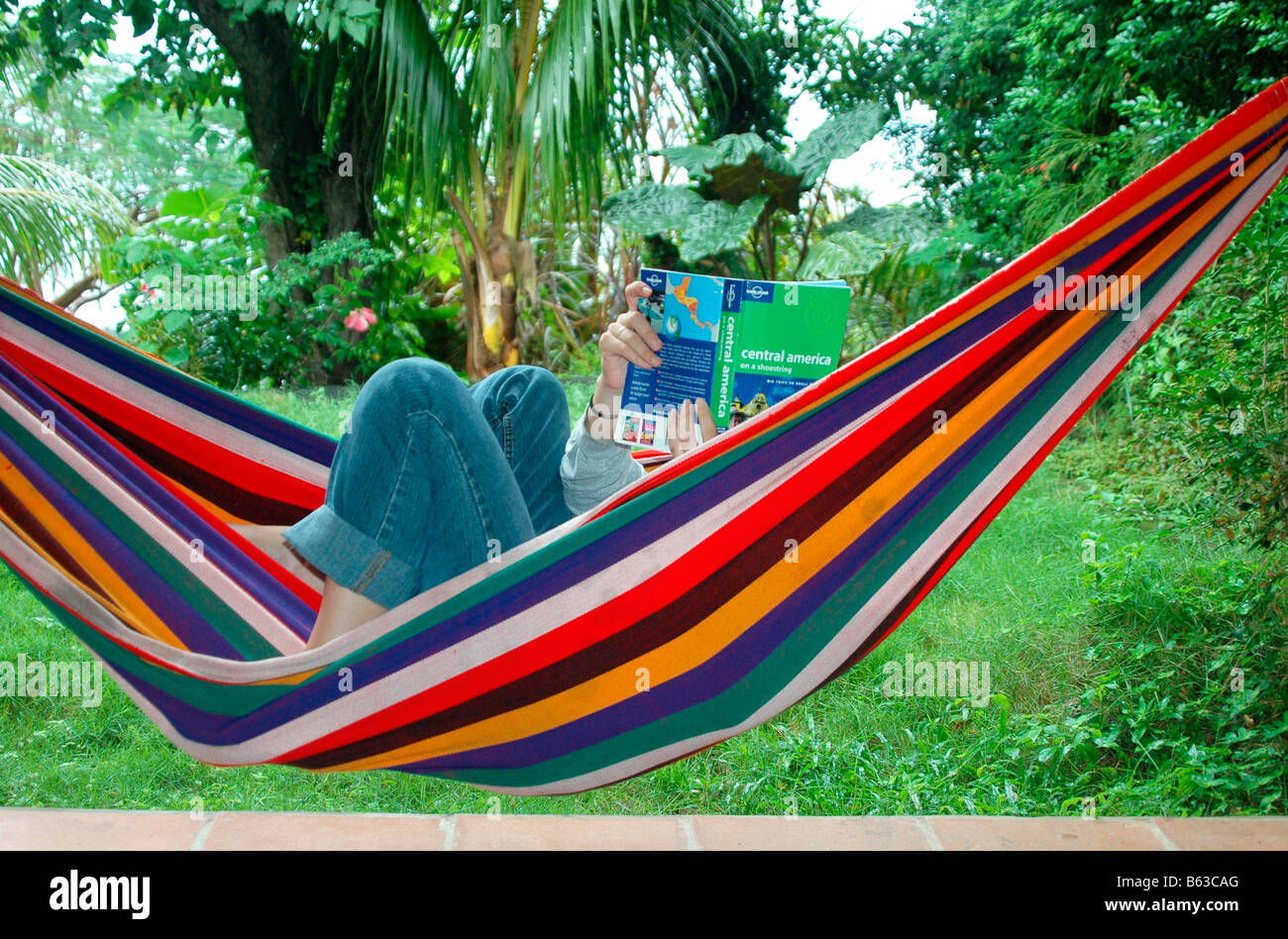 Girl on hammock hi-res stock photography and images - Alamy