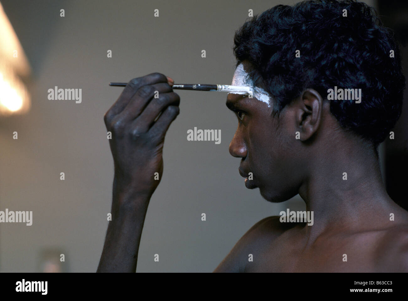 Tribal white face aboriginal face paint hi-res stock photography and ...