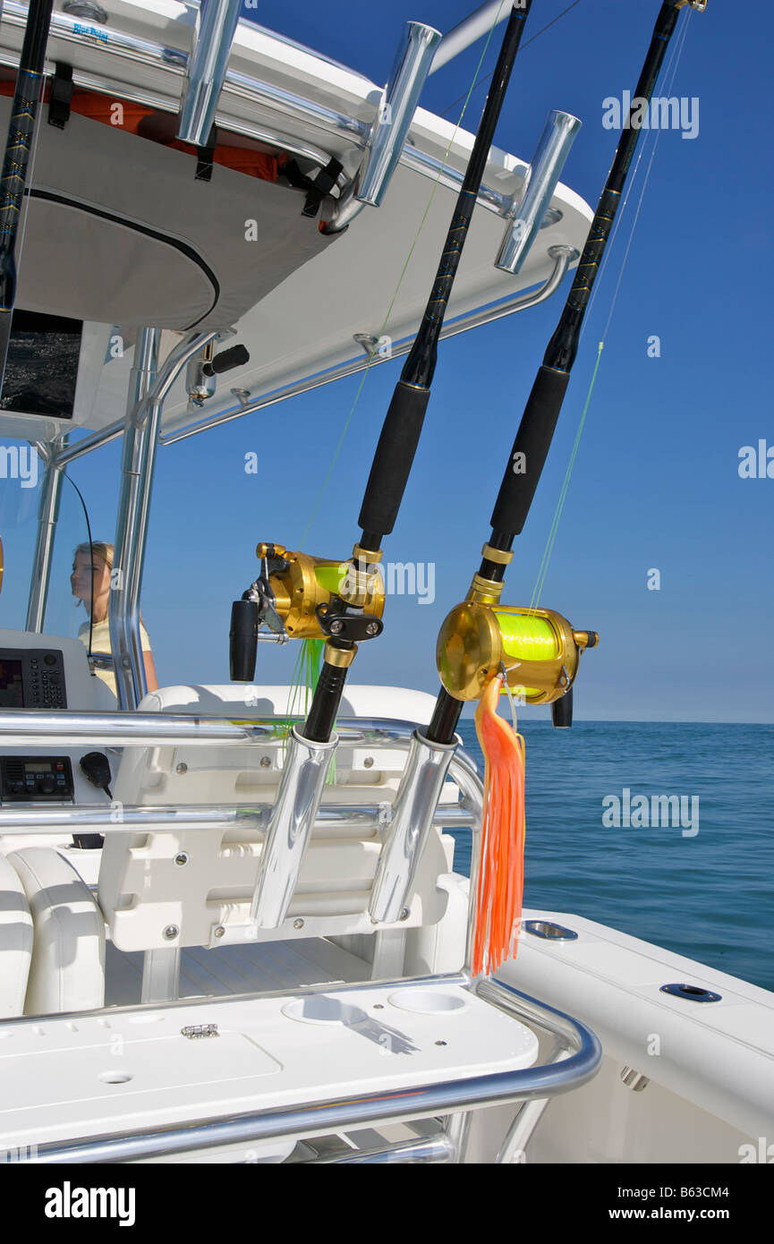 Fishing rods in a speedboat Stock Photo - Alamy