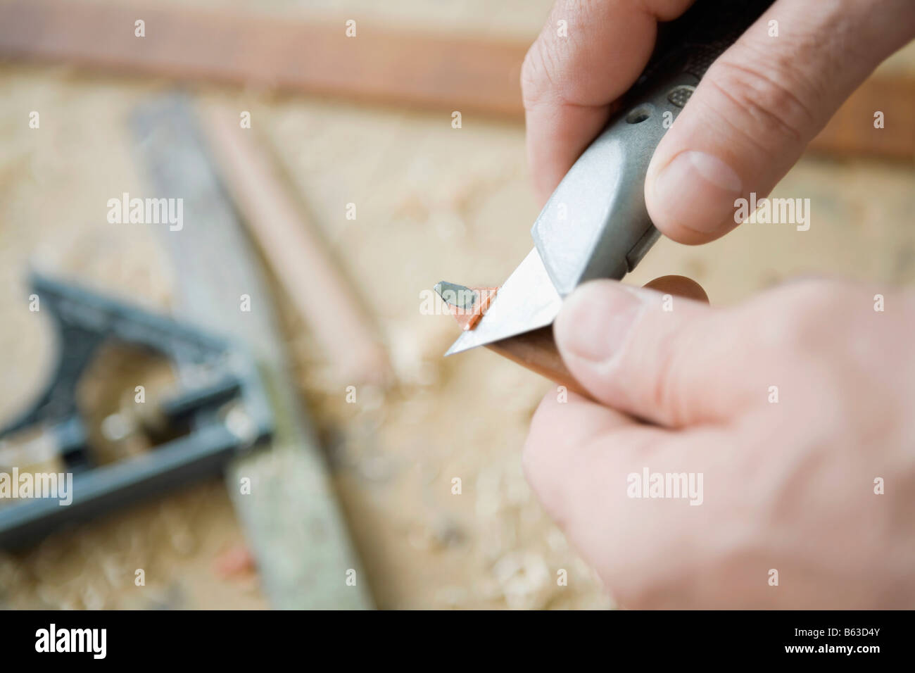 Man sharpening pencil hi-res stock photography and images - Alamy