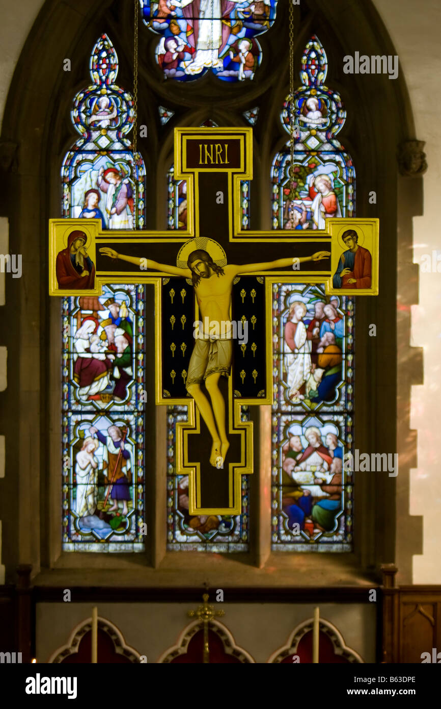 Church cross in front of a stained glass window Stock Photo - Alamy