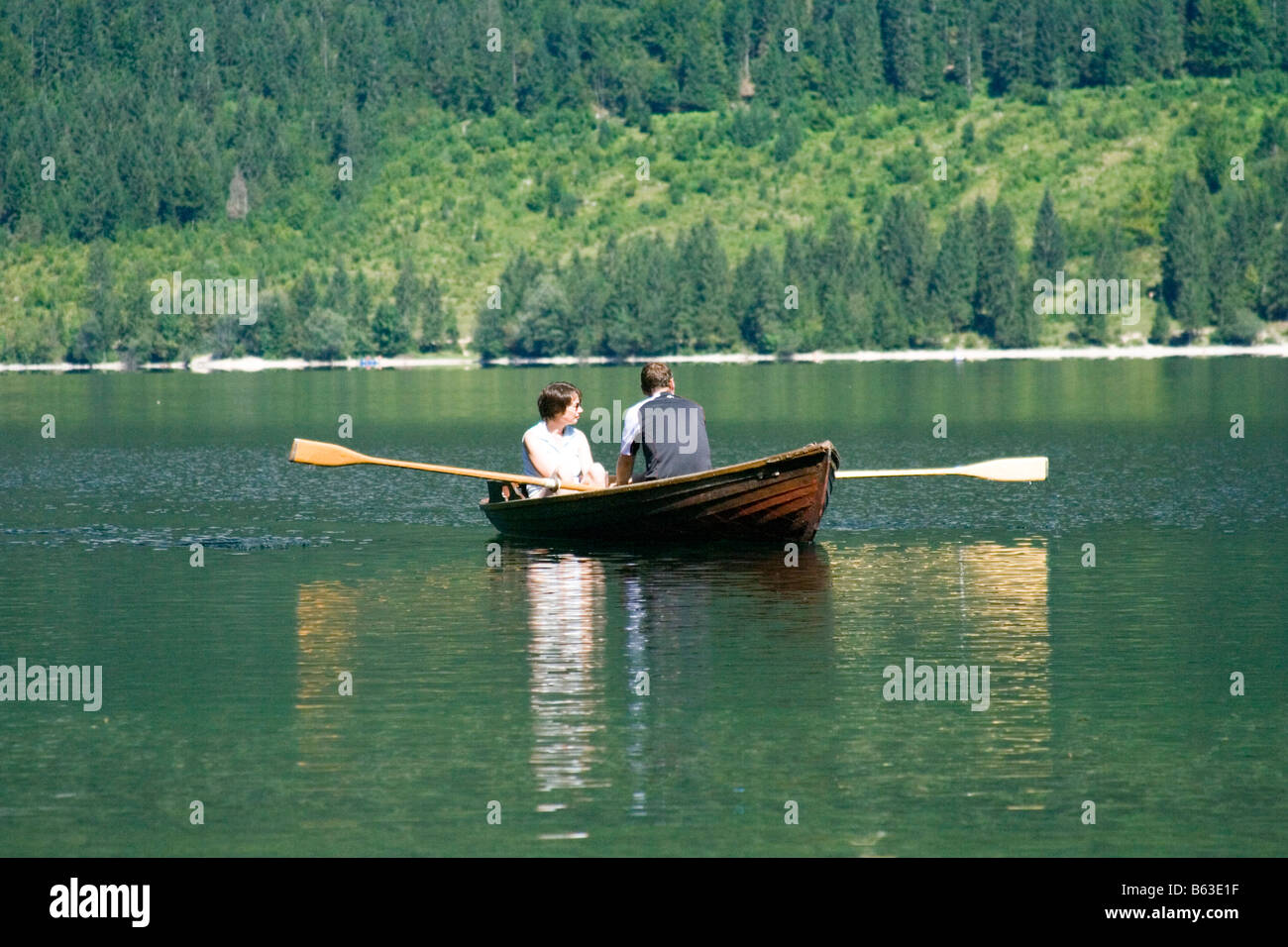 Couple in a rowing boat hi-res stock photography and images - Alamy