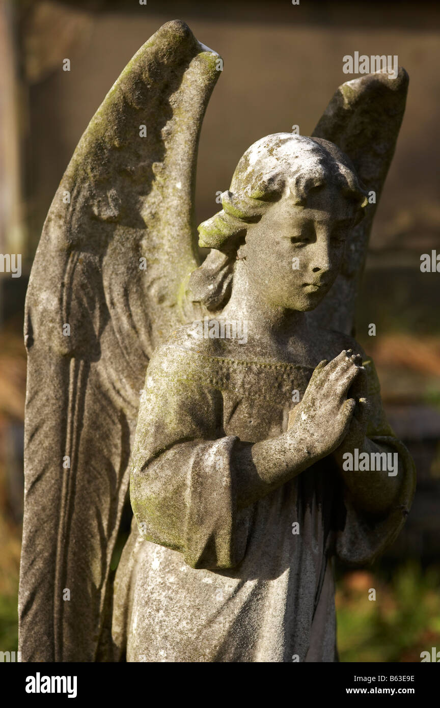 Angel in cemetery Stock Photo - Alamy