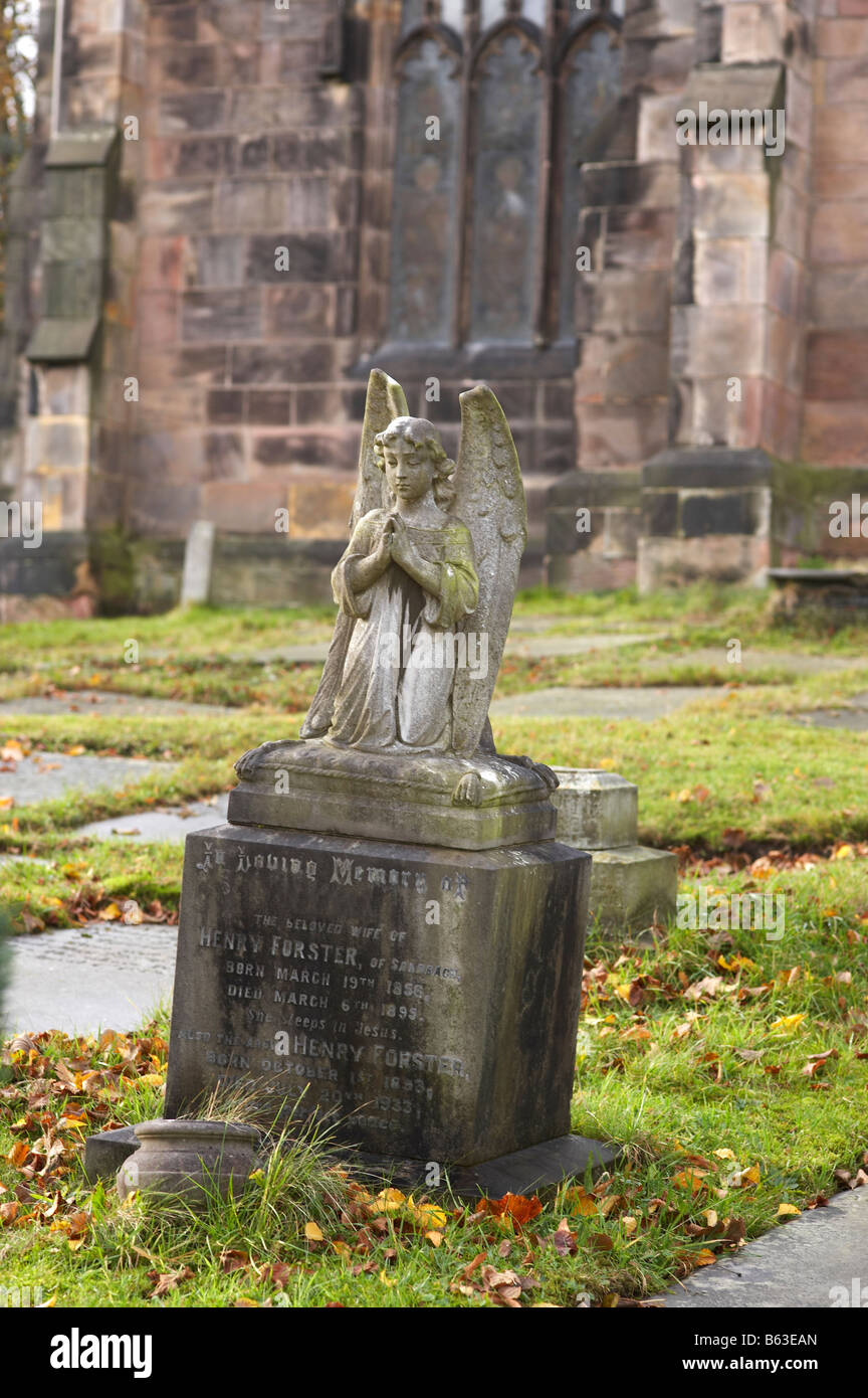 Angel on gravestone Stock Photo - Alamy
