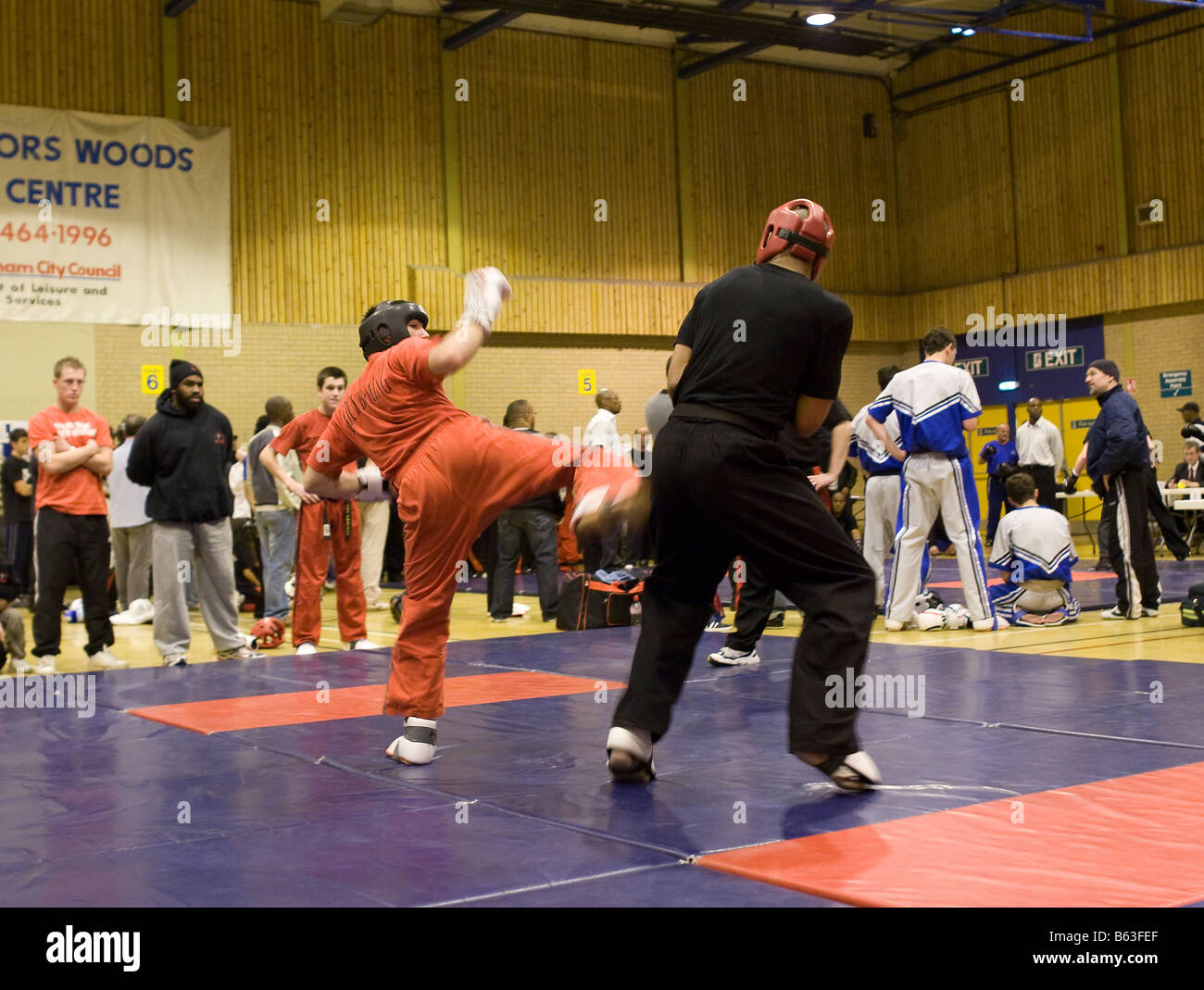 Competitors fighting in a kung fu tournament Stock Photo - Alamy