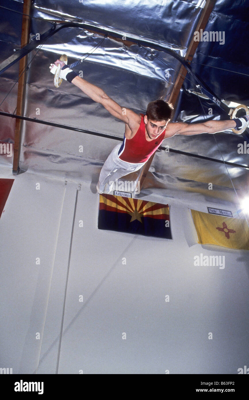Teen boy gymnastics rings hi-res stock photography and images - Alamy