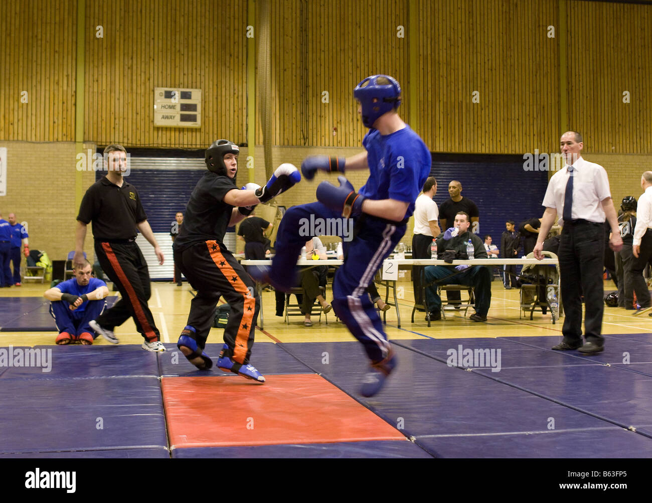Competitors fighting in a kung fu tournament Stock Photo - Alamy