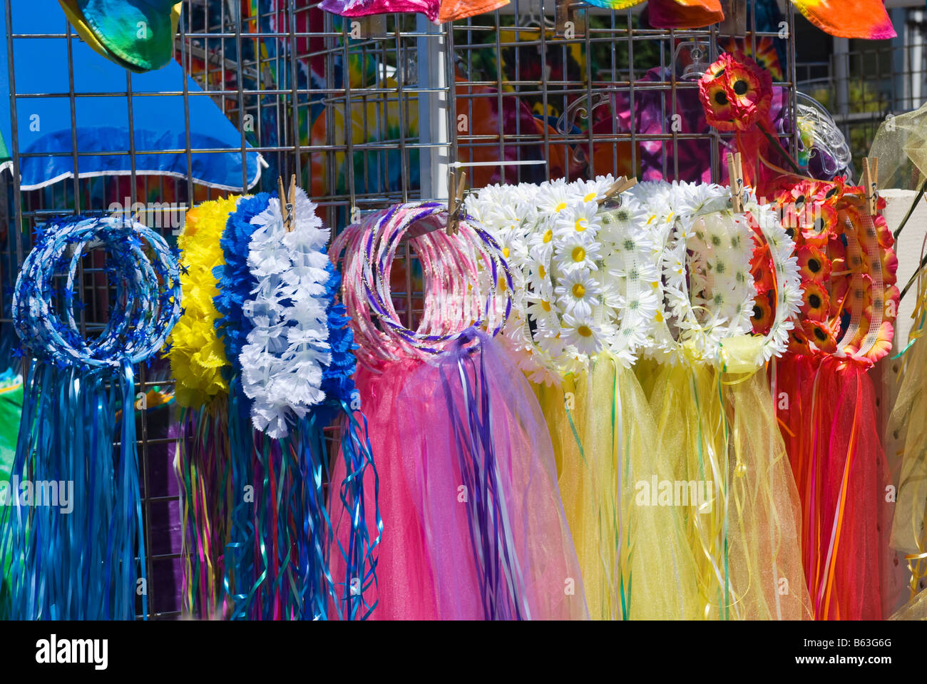 Colorful tiaras on sale at a fair Stock Photo - Alamy