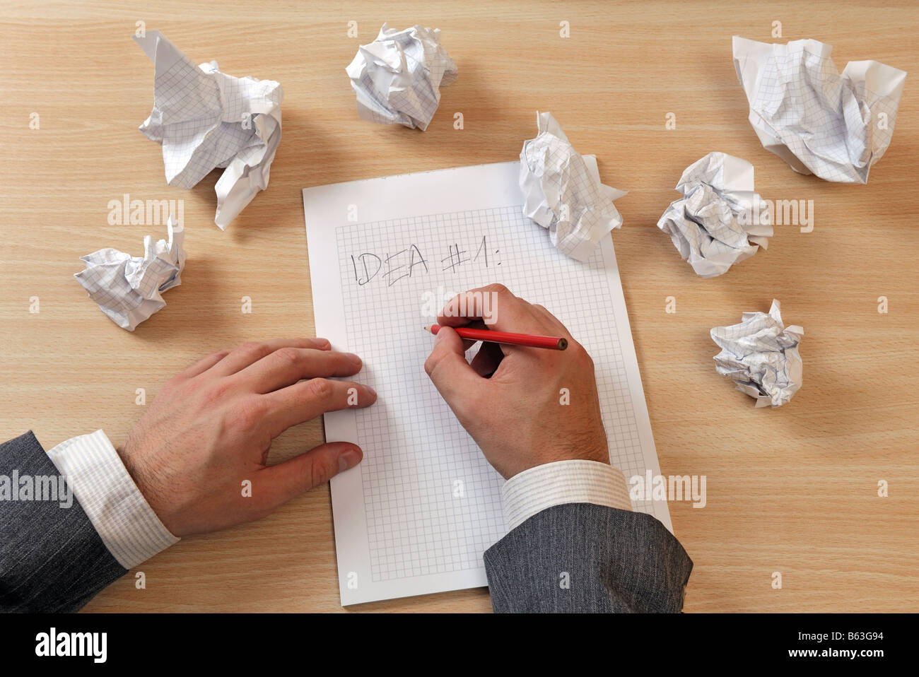 Writing ideas down on paper Stock Photo - Alamy