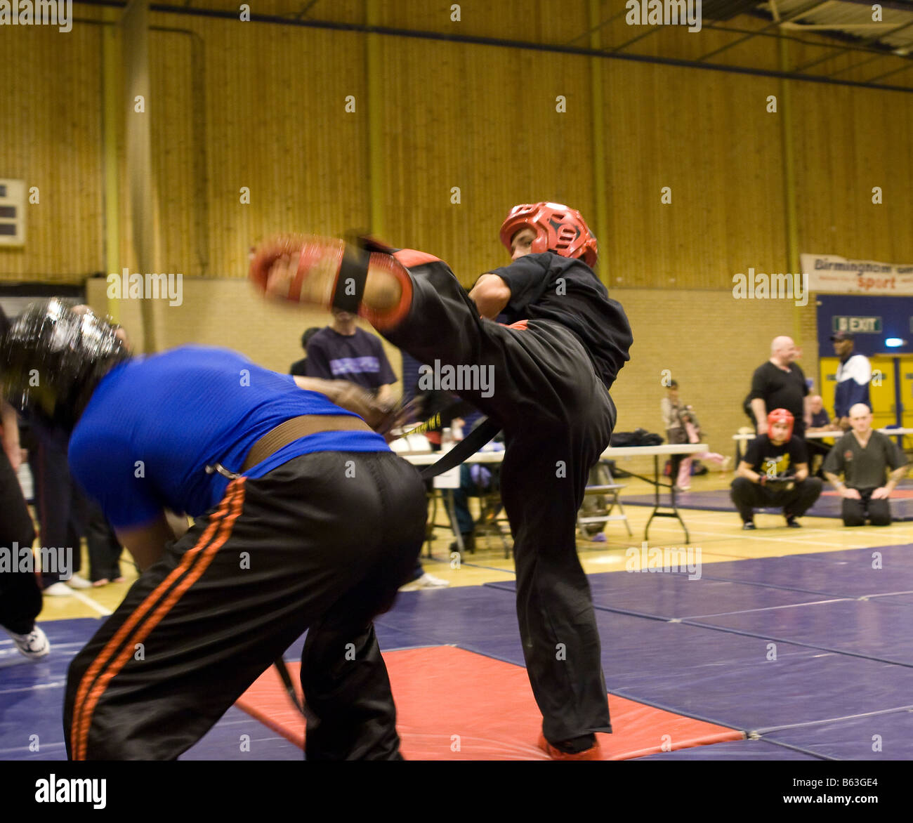 Competitors fighting in a kung fu tournament Stock Photo - Alamy