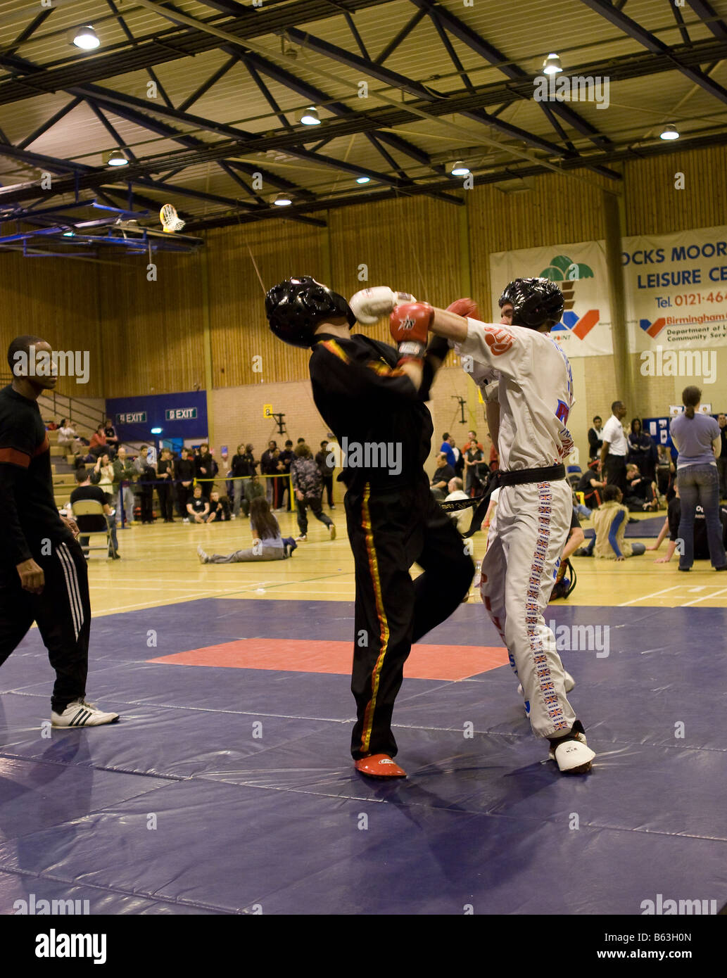 Competitors fighting in a kung fu tournament Stock Photo - Alamy