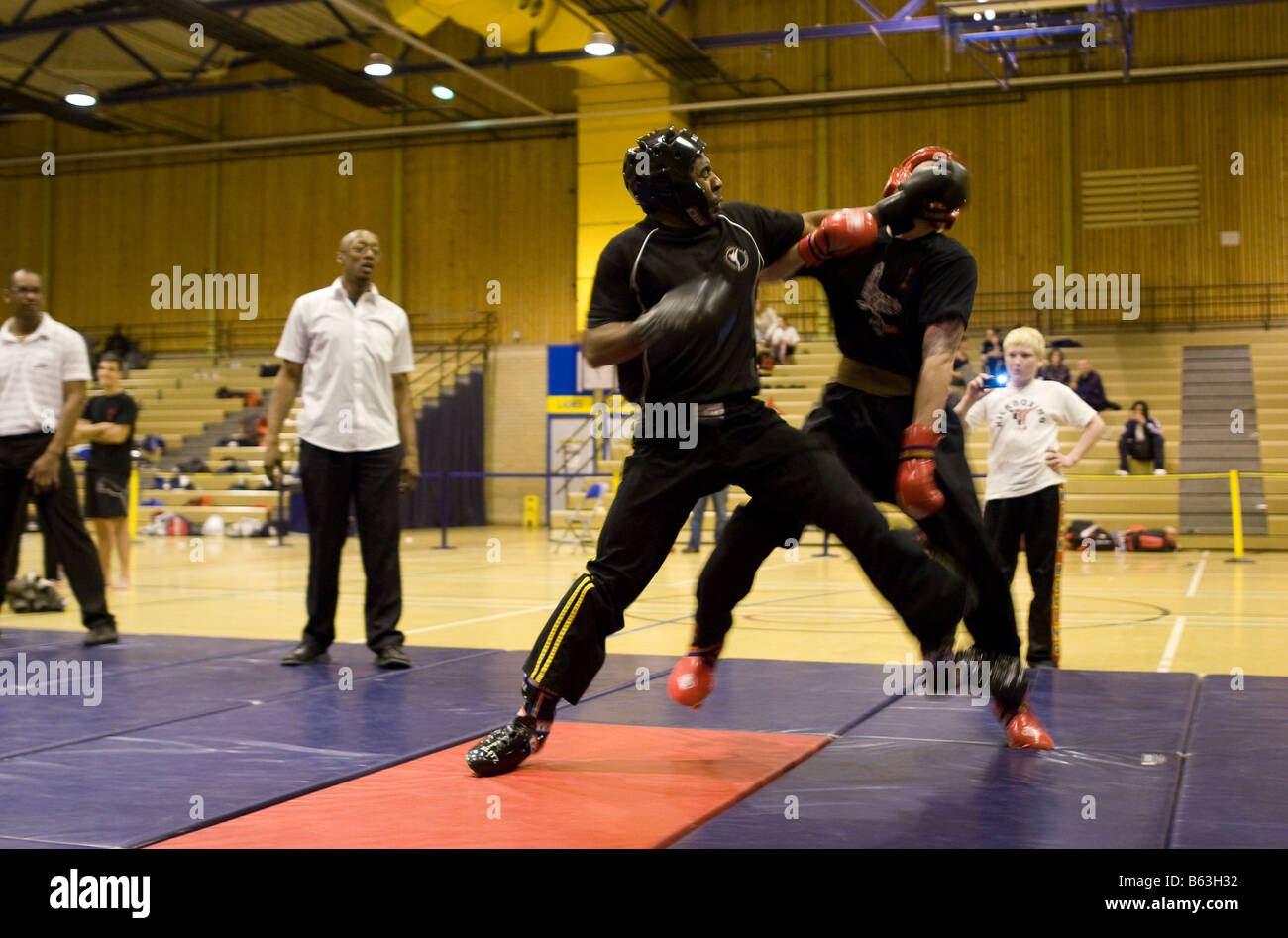 Competitors fighting in a kung fu tournament Stock Photo - Alamy