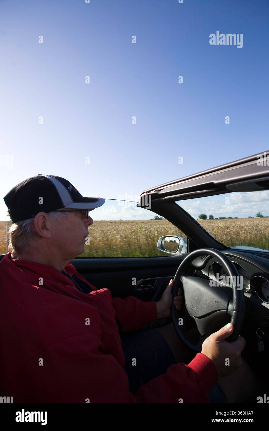 man drives an open car Stock Photo - Alamy