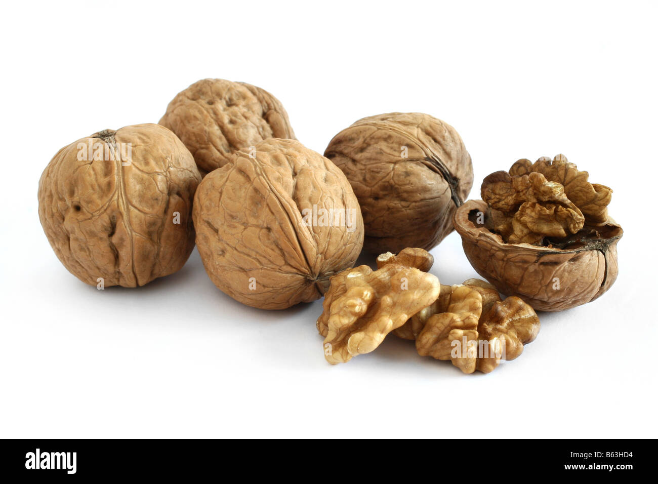 Walnuts over white background Stock Photo - Alamy
