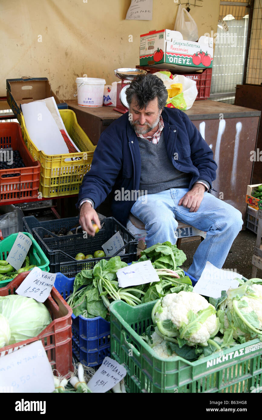 Vegetable market seller Stock Photo - Alamy