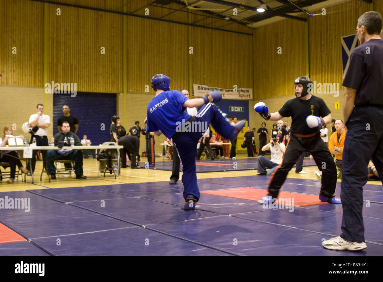 Competitors fighting in a kung fu tournament Stock Photo - Alamy