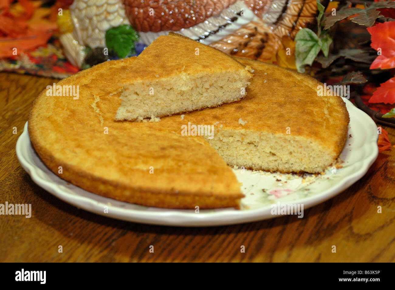 Cornbread on a serving plate This bread was baked southern style in a ...