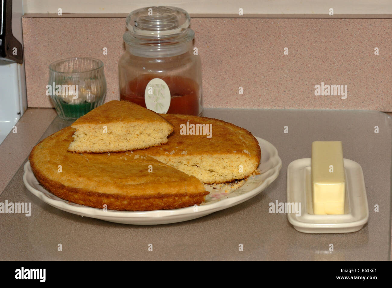 Cornbread on a serving plate This bread was baked southern style in a ...